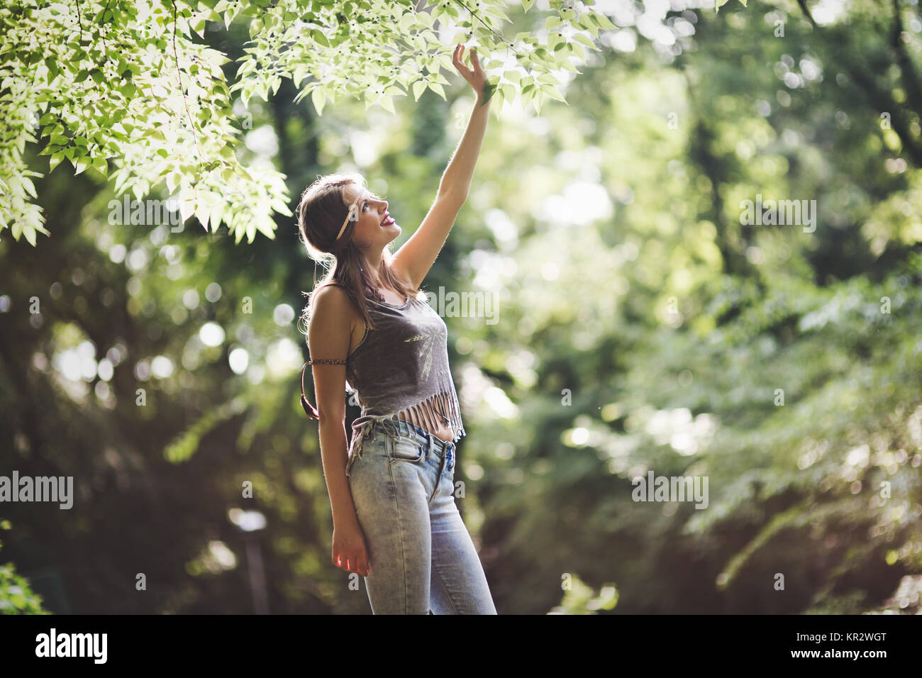 Happy cheerful female in nature Stock Photo - Alamy