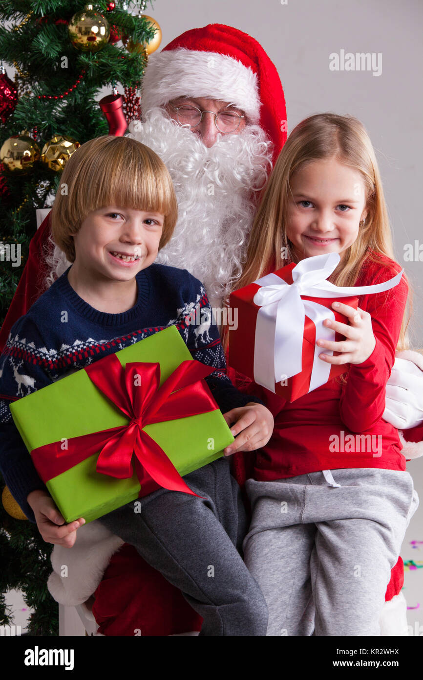 Santa claus child knee hi-res stock photography and images - Alamy