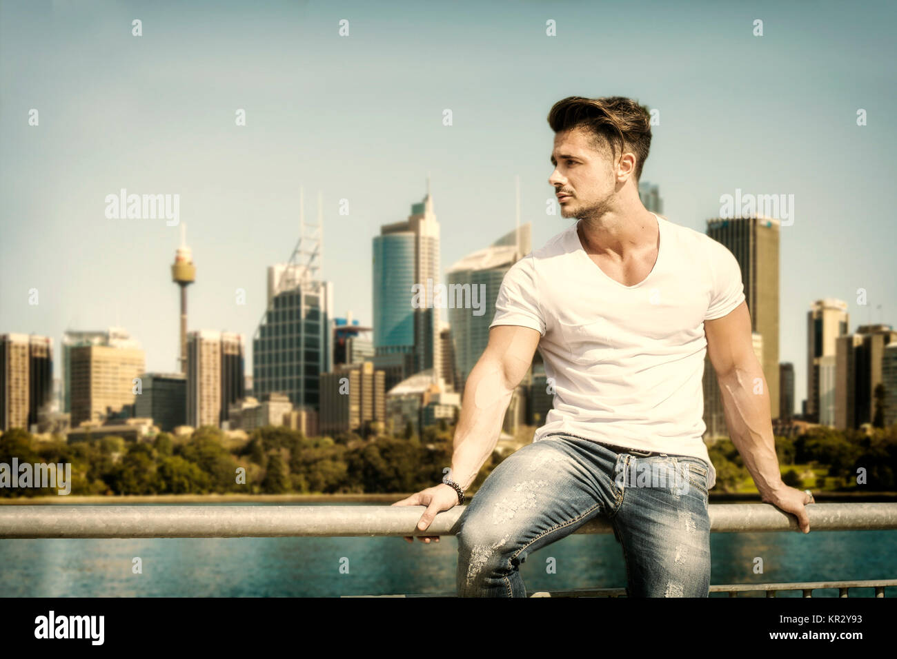 Handsome man at city skyline Stock Photo - Alamy