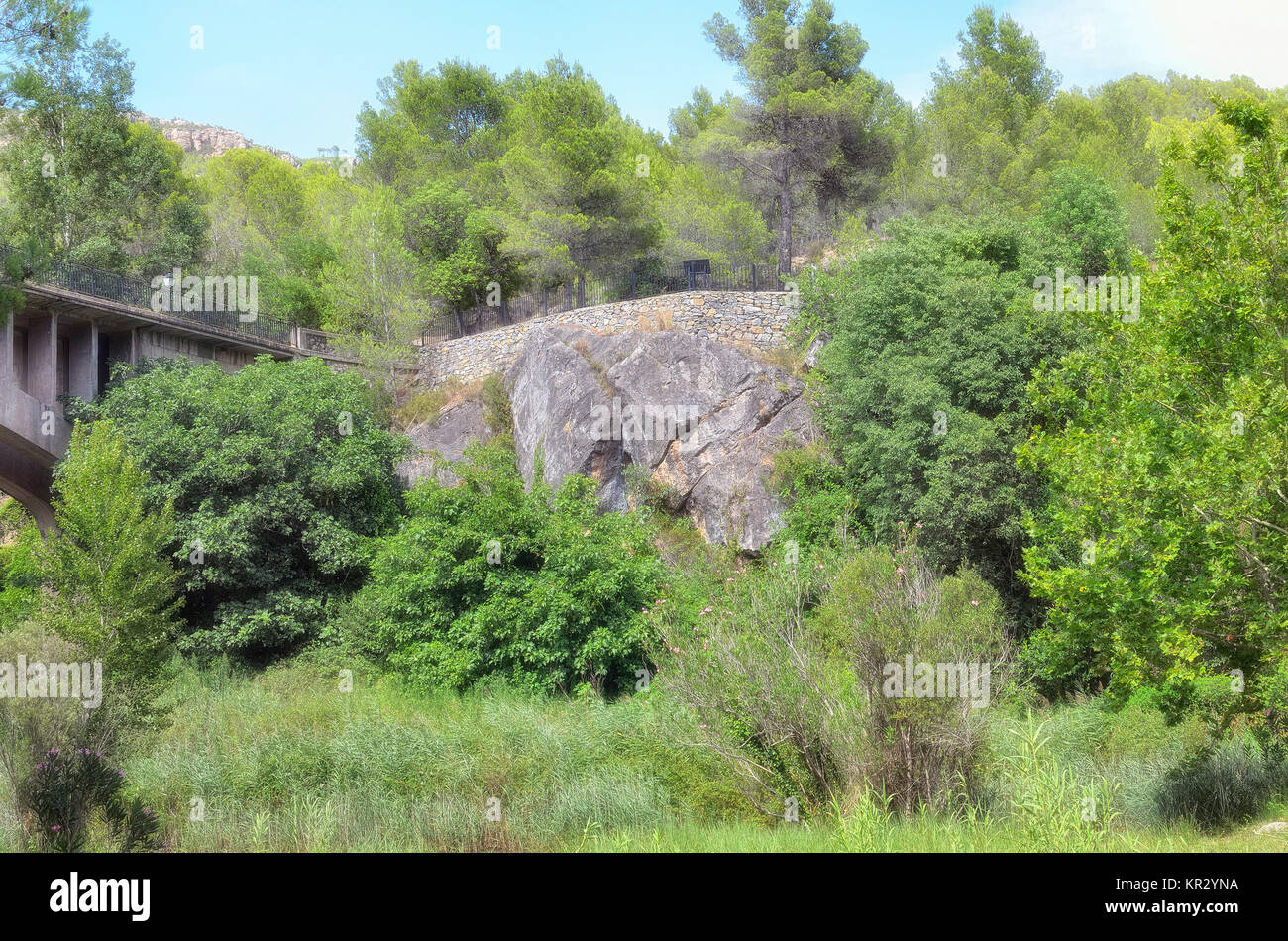 Lookout point viewed from the riverside of Mijares river. Green ...