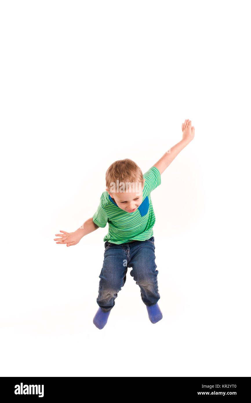 Active happy little boy jumping isolated on white Stock Photo - Alamy