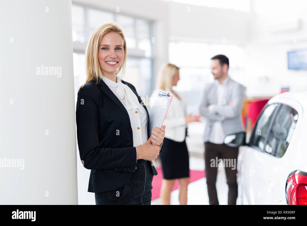 Picture of professional salesperson working in car dealership Stock ...