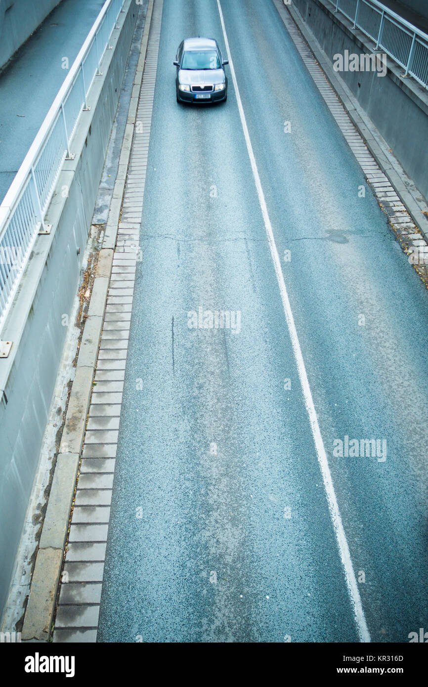 car running fast on the road, motion and speed concept Stock Photo - Alamy