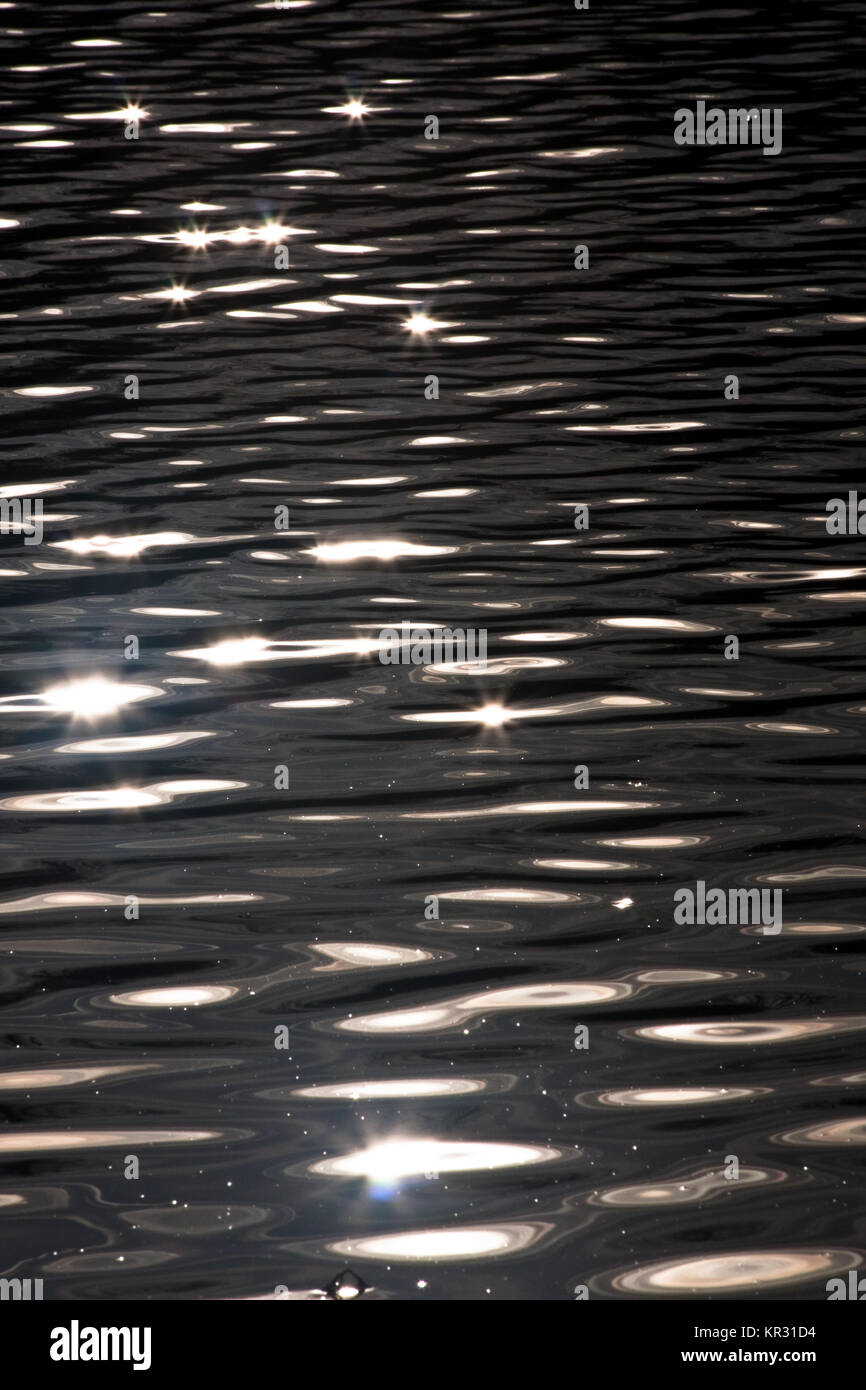 Water surface waves sun in hi-res stock photography and images - Alamy