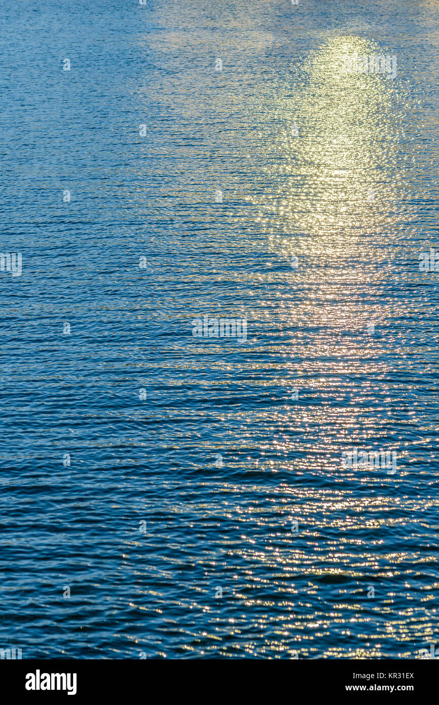Lake at sunset time background Stock Photo - Alamy