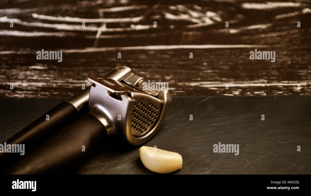 A composition of cloves of garlic on the table Stock Photo - Alamy