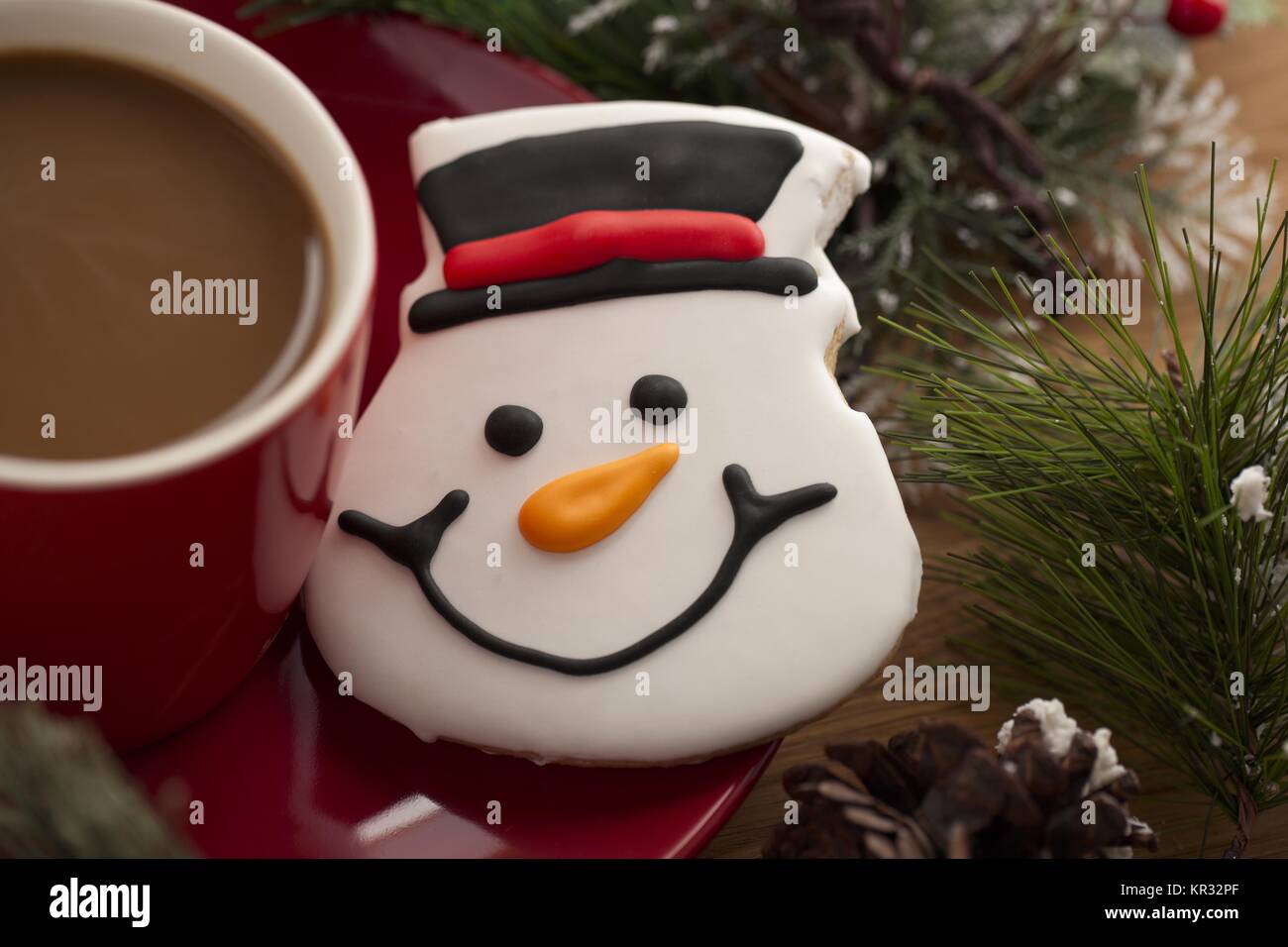 snowman cookie and coffee cup Stock Photo - Alamy