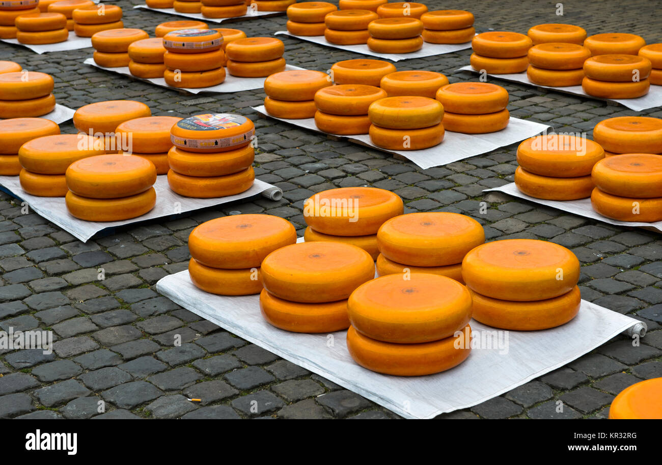 Gouda cheese wheels piled up on the cheese market, Gouda, Netherlands ...