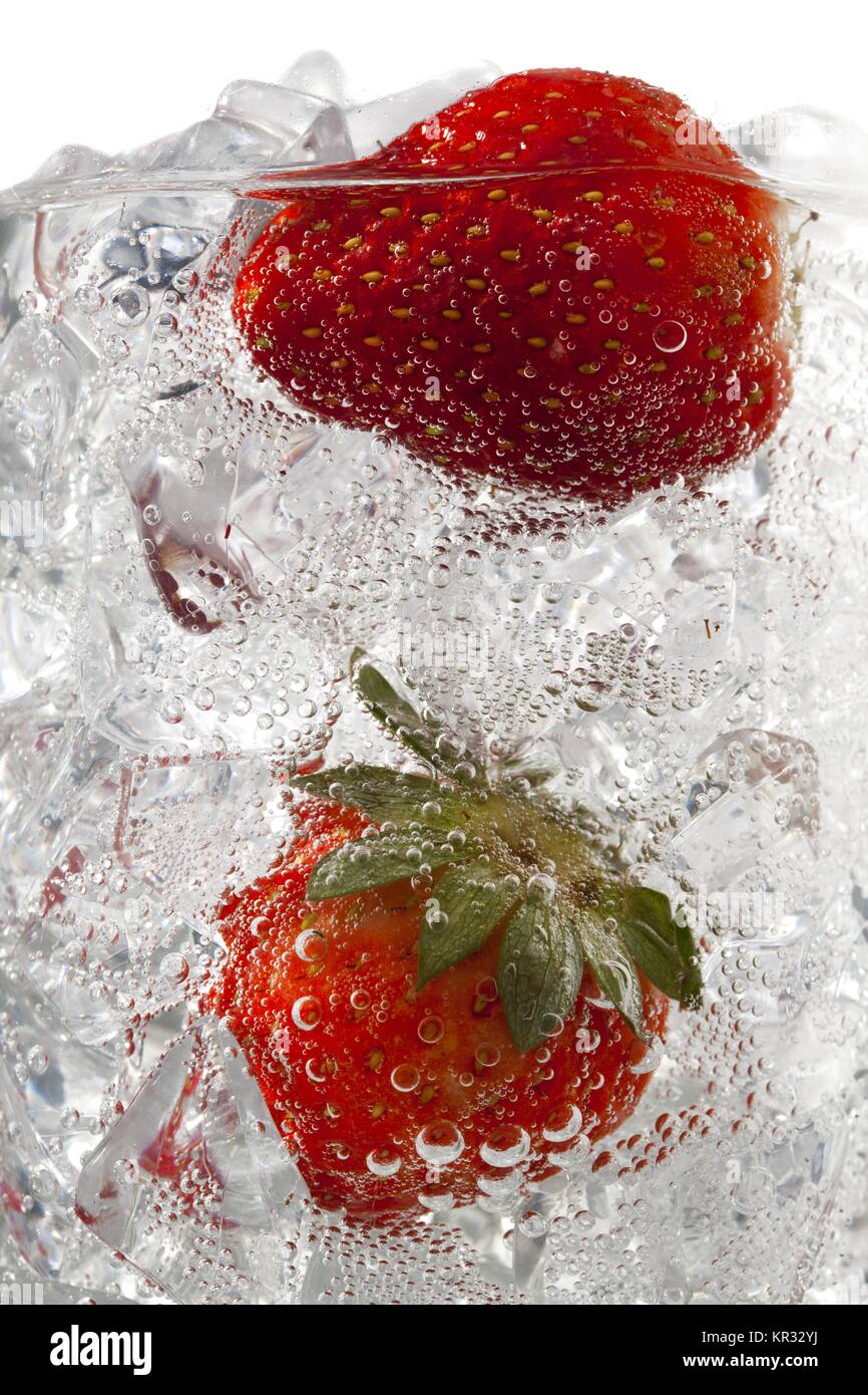 Strawberries with ice cubes hi-res stock photography and images - Alamy