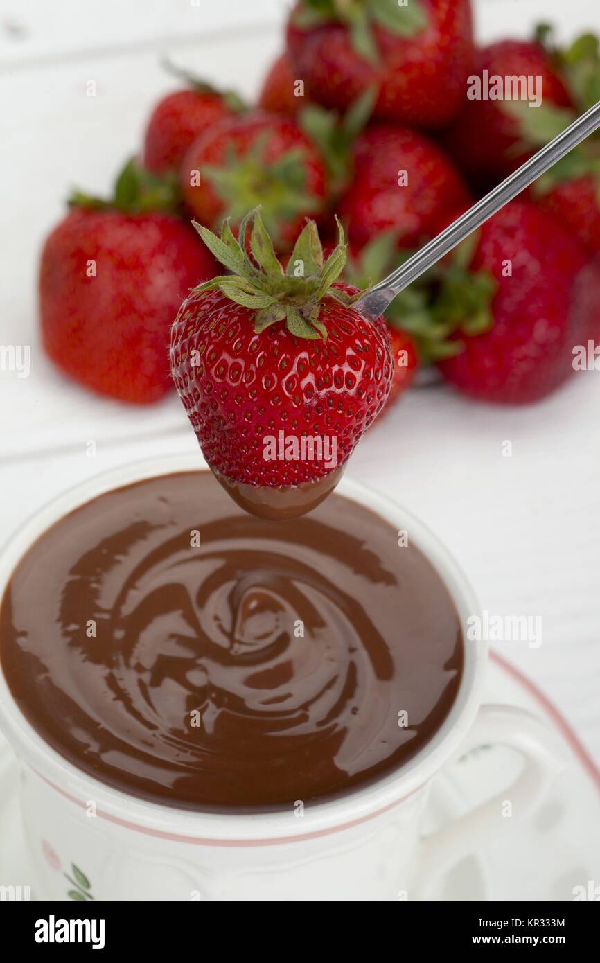 strawberry with melted chocolate Stock Photo - Alamy