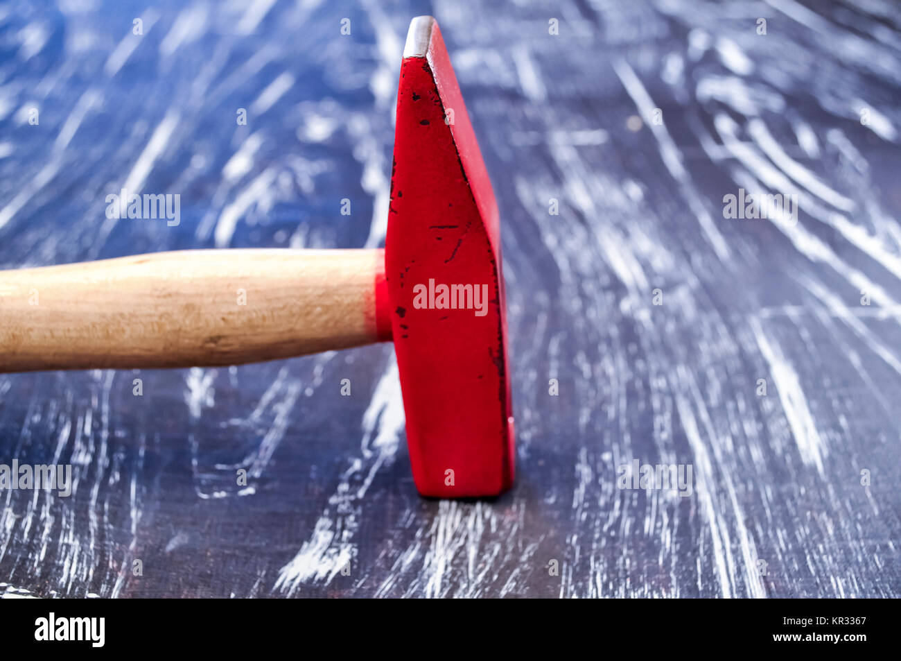 Hammer to repair lying on a wooden table. Men's housework. Worki Stock ...