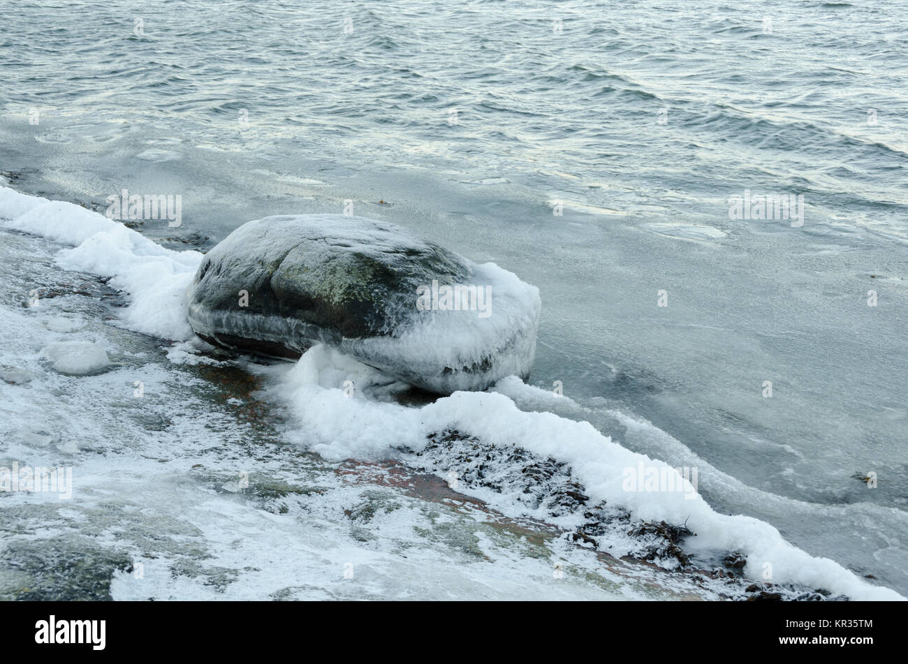 Frosty stone in the cold water Stock Photo - Alamy