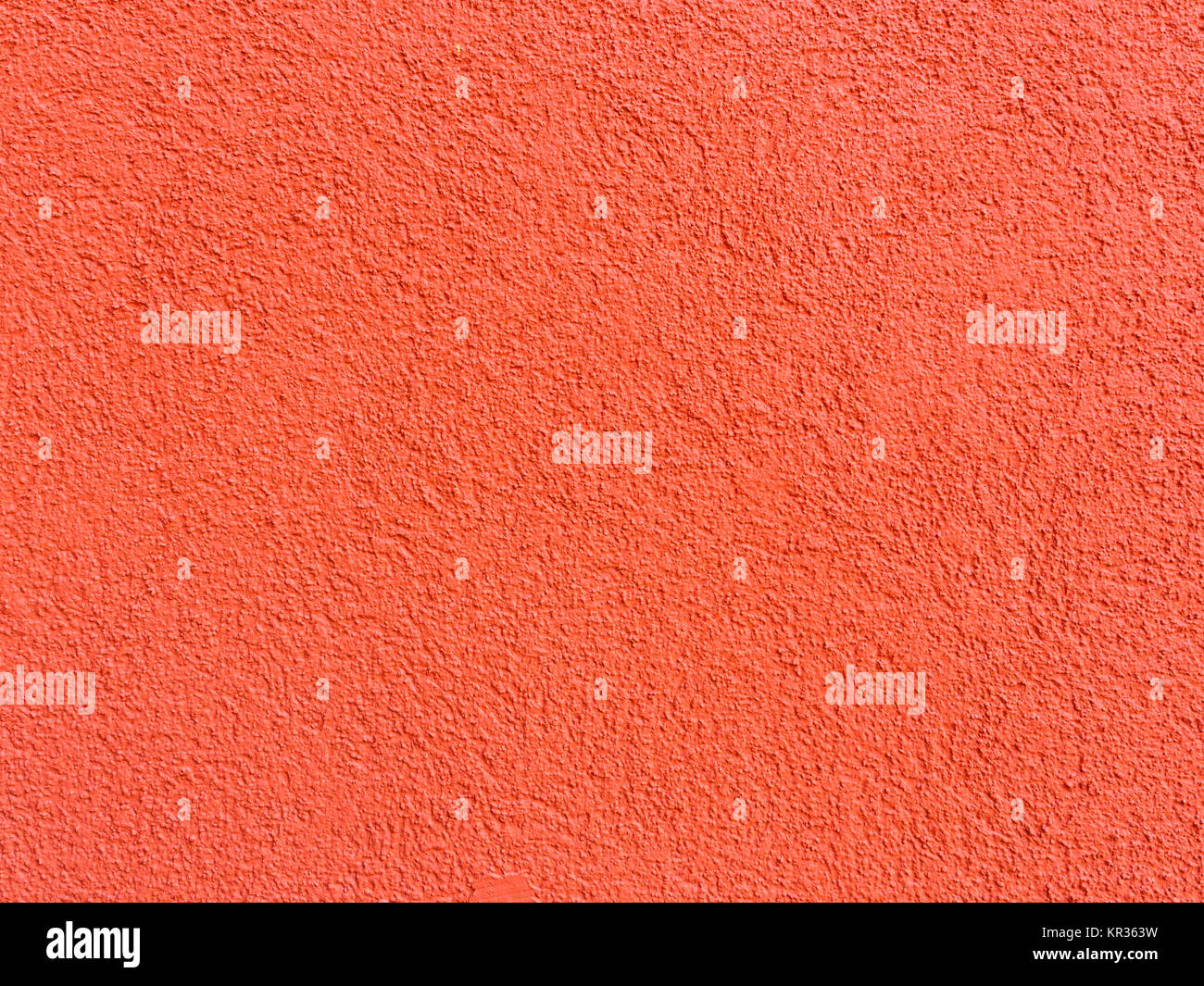 Red wall texture background. Textured concrete plaster with spraying in ...