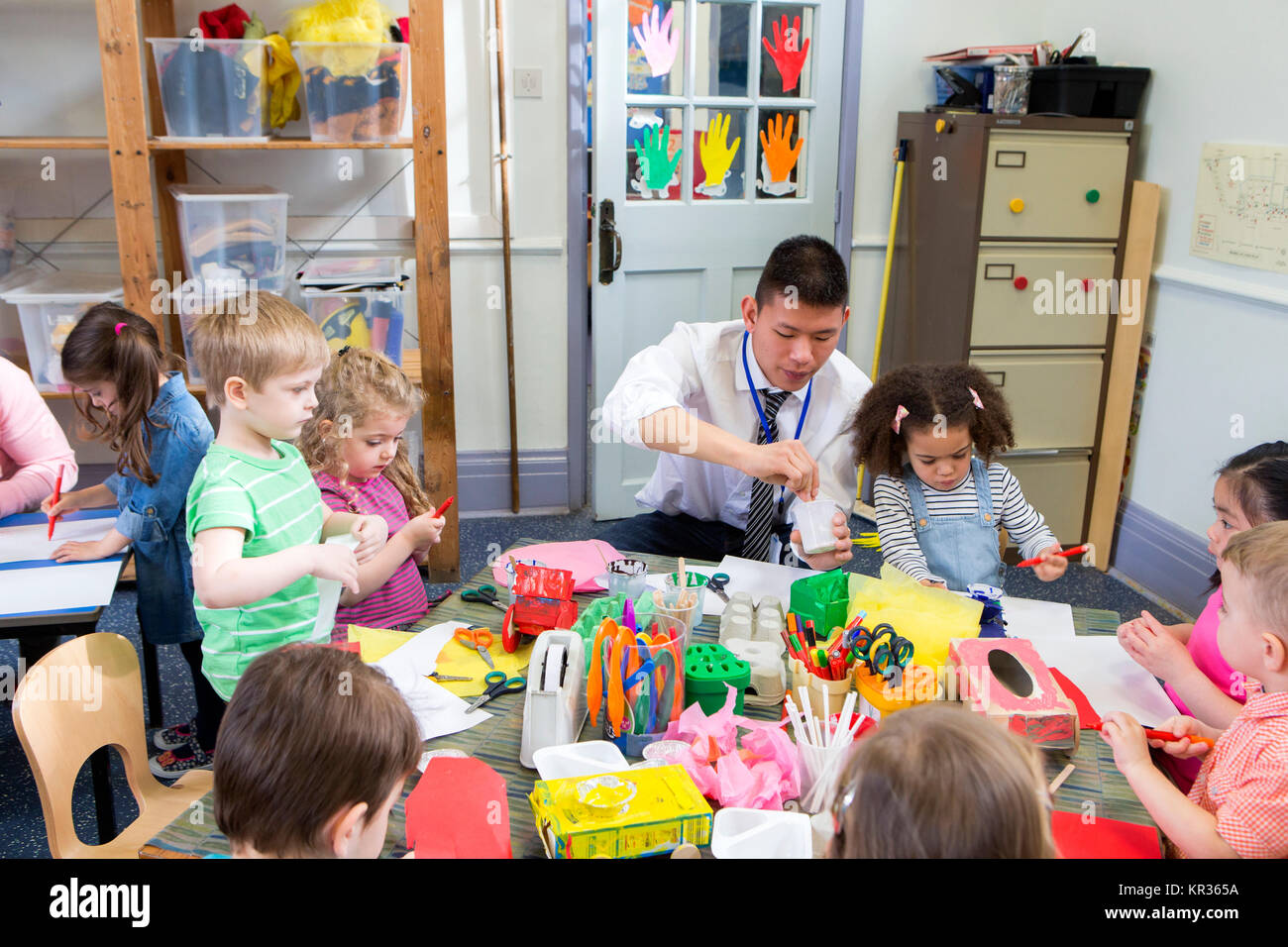 Craft Time at Nursery Stock Photo - Alamy