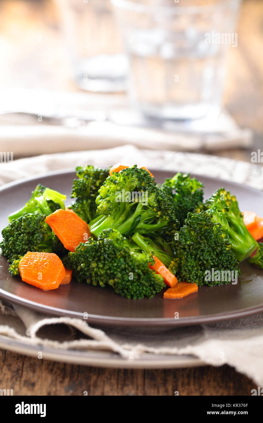 Steamed broccoli on plate Stock Photo - Alamy