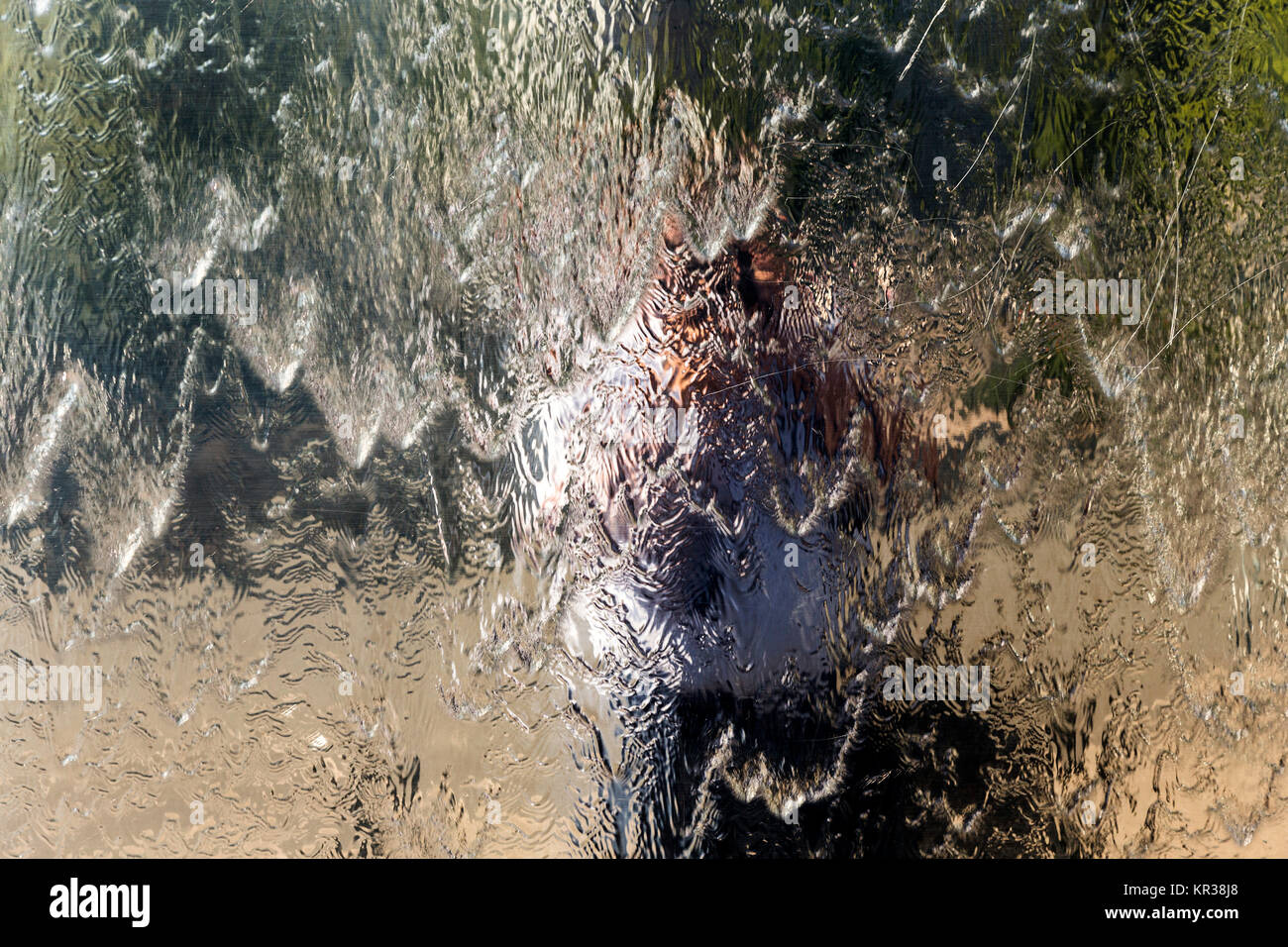 beautiful pattern of flowing water at a metal wall Stock Photo - Alamy