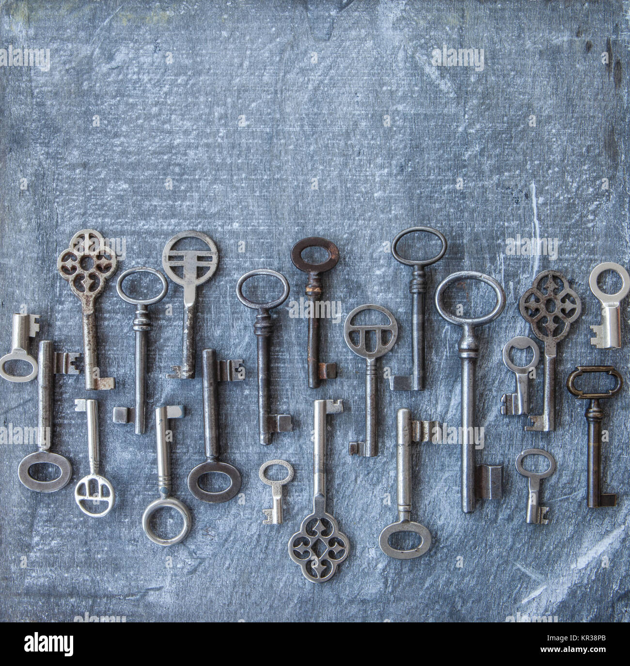 various keys on dark background Stock Photo - Alamy