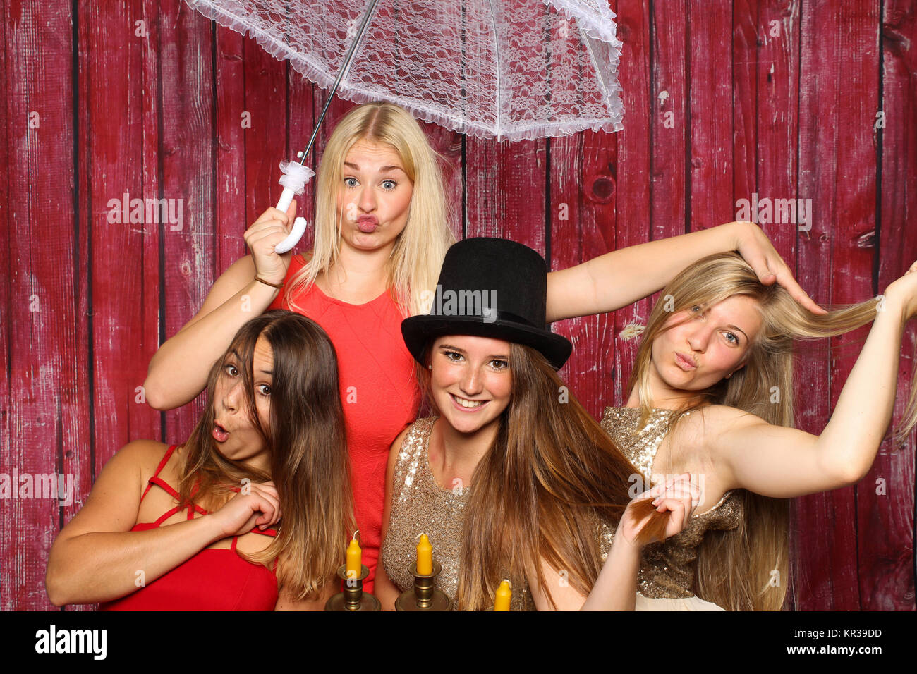 young women make party and fool around - fotobox party Stock Photo - Alamy