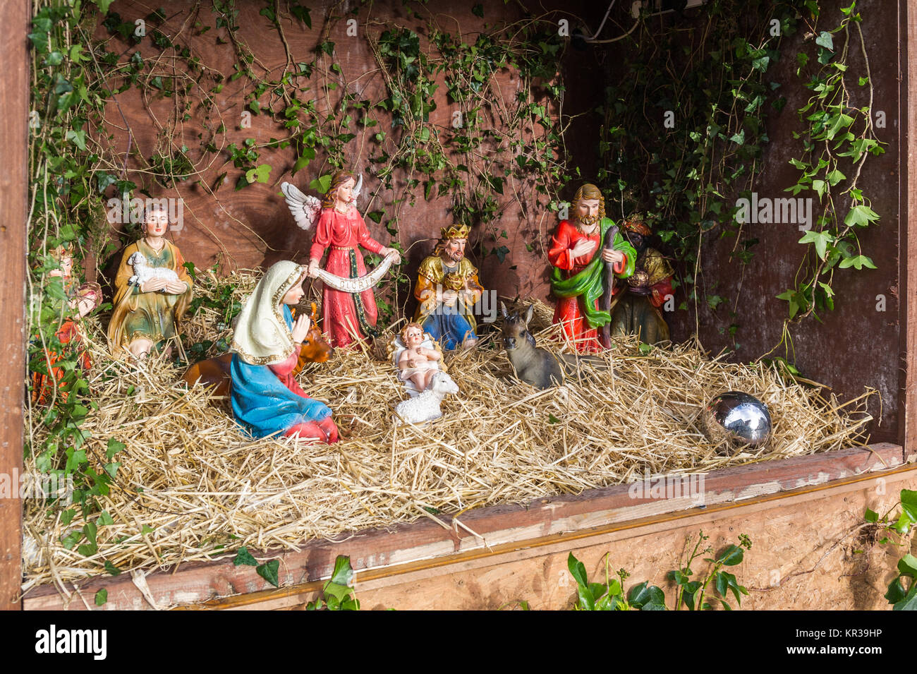 Christmas Nativity scene on a bed of straw Stock Photo - Alamy