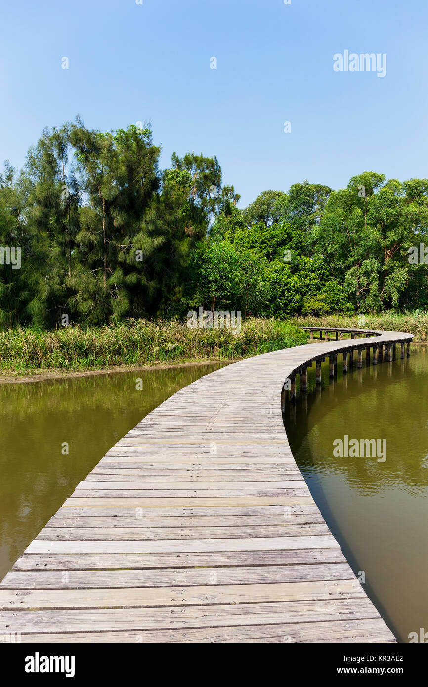 Wooden path across the lake Stock Photo - Alamy