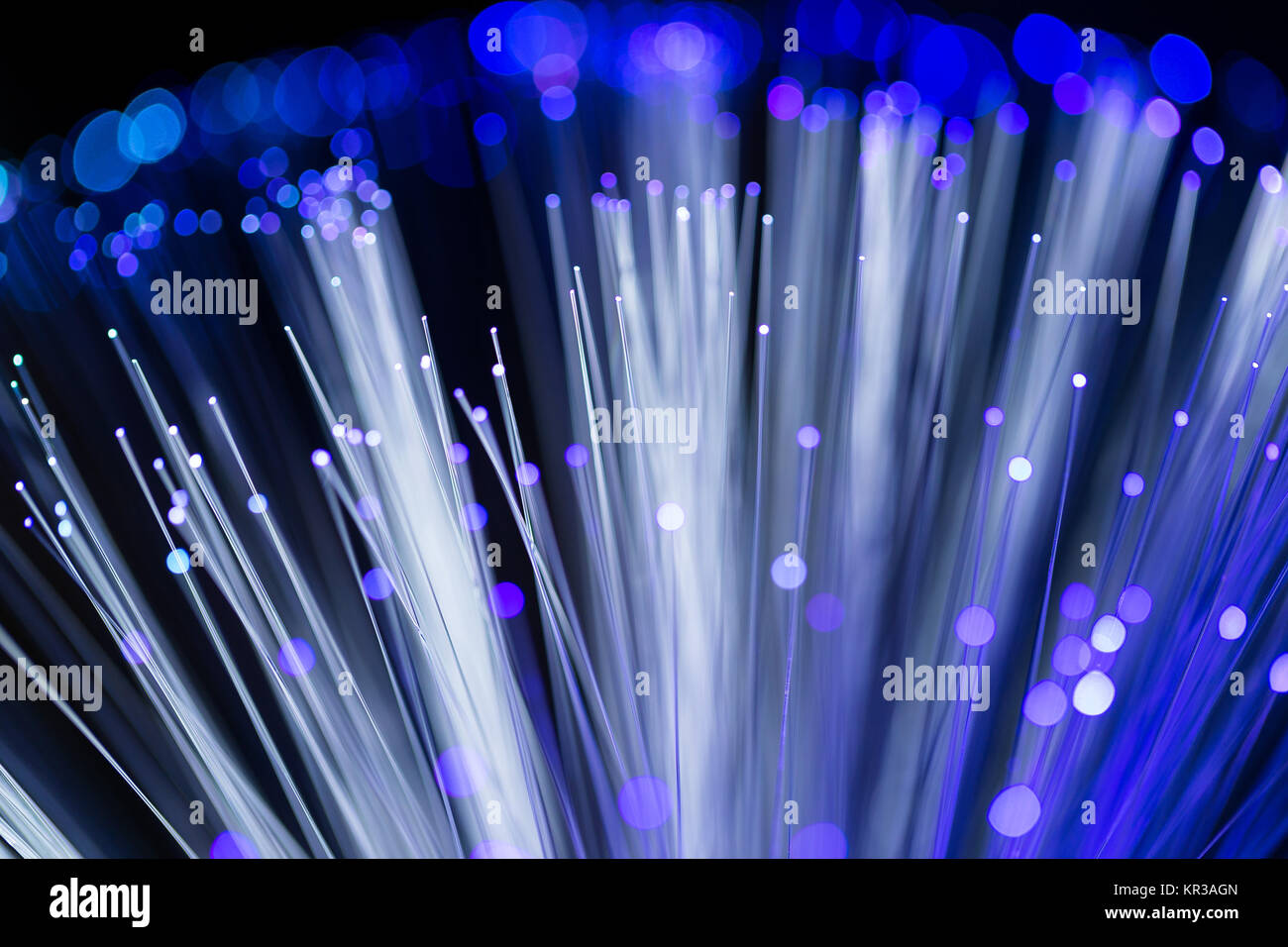 Blue shining fiber optic Stock Photo - Alamy