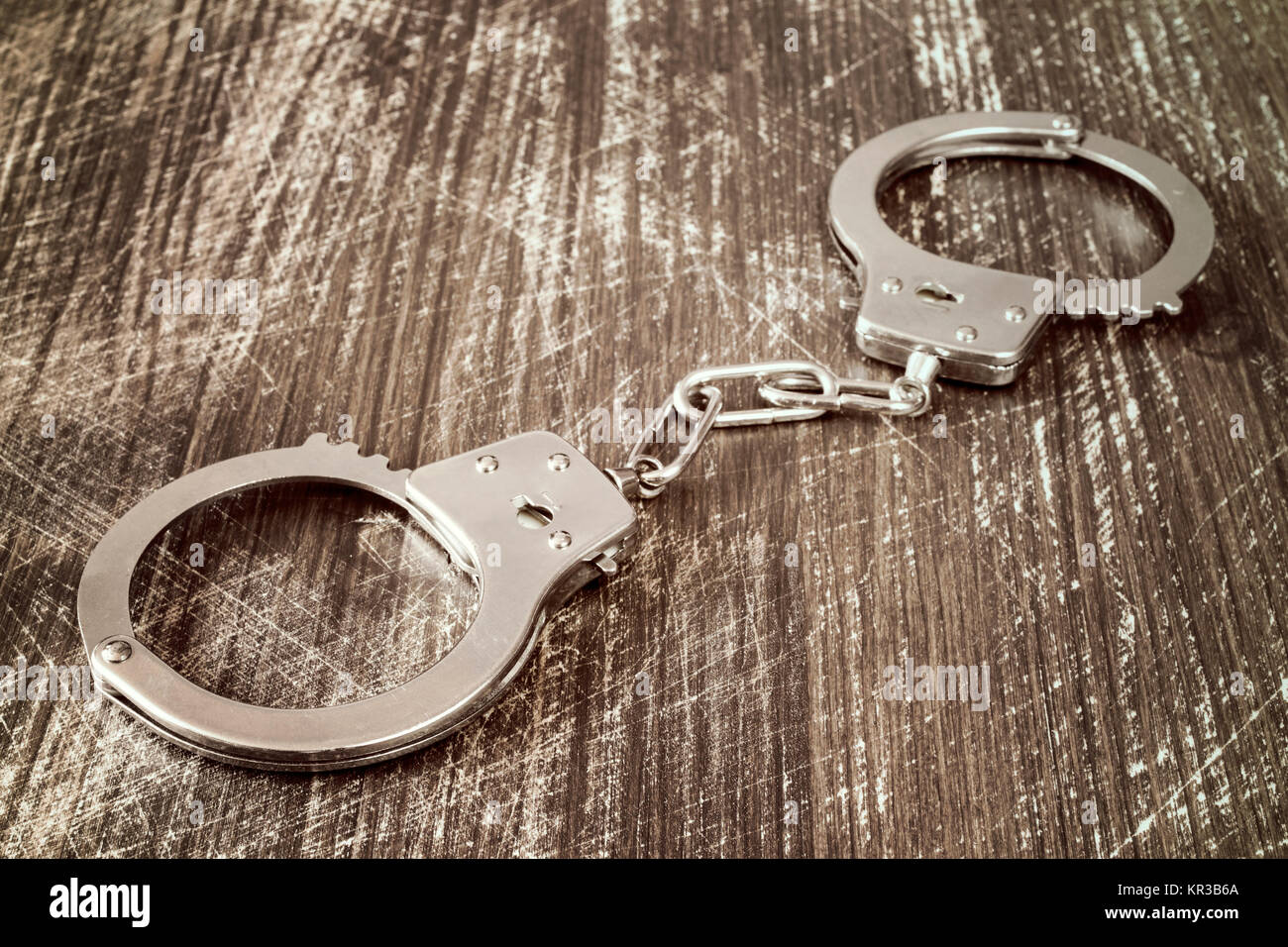 Close-up view of handcuffs Stock Photo - Alamy