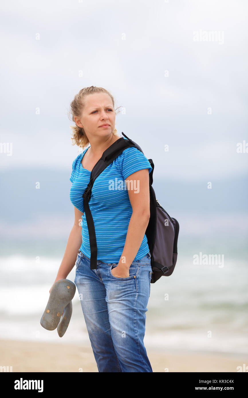 Woman with a backpack Stock Photo - Alamy