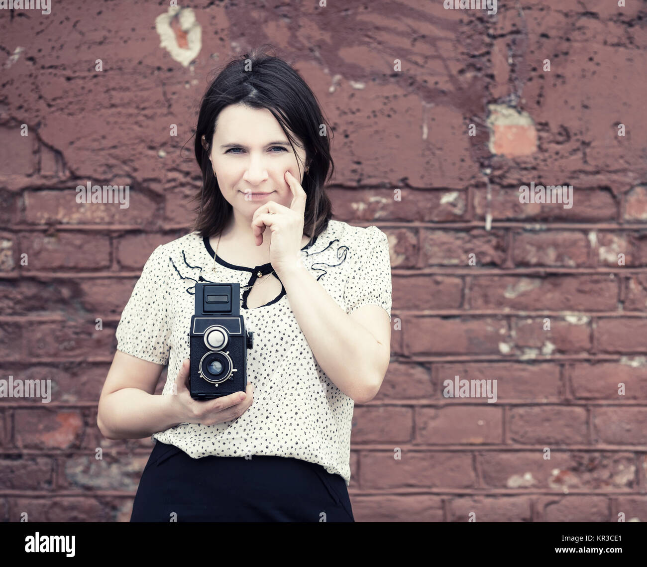 Woman with vintage camera Stock Photo - Alamy