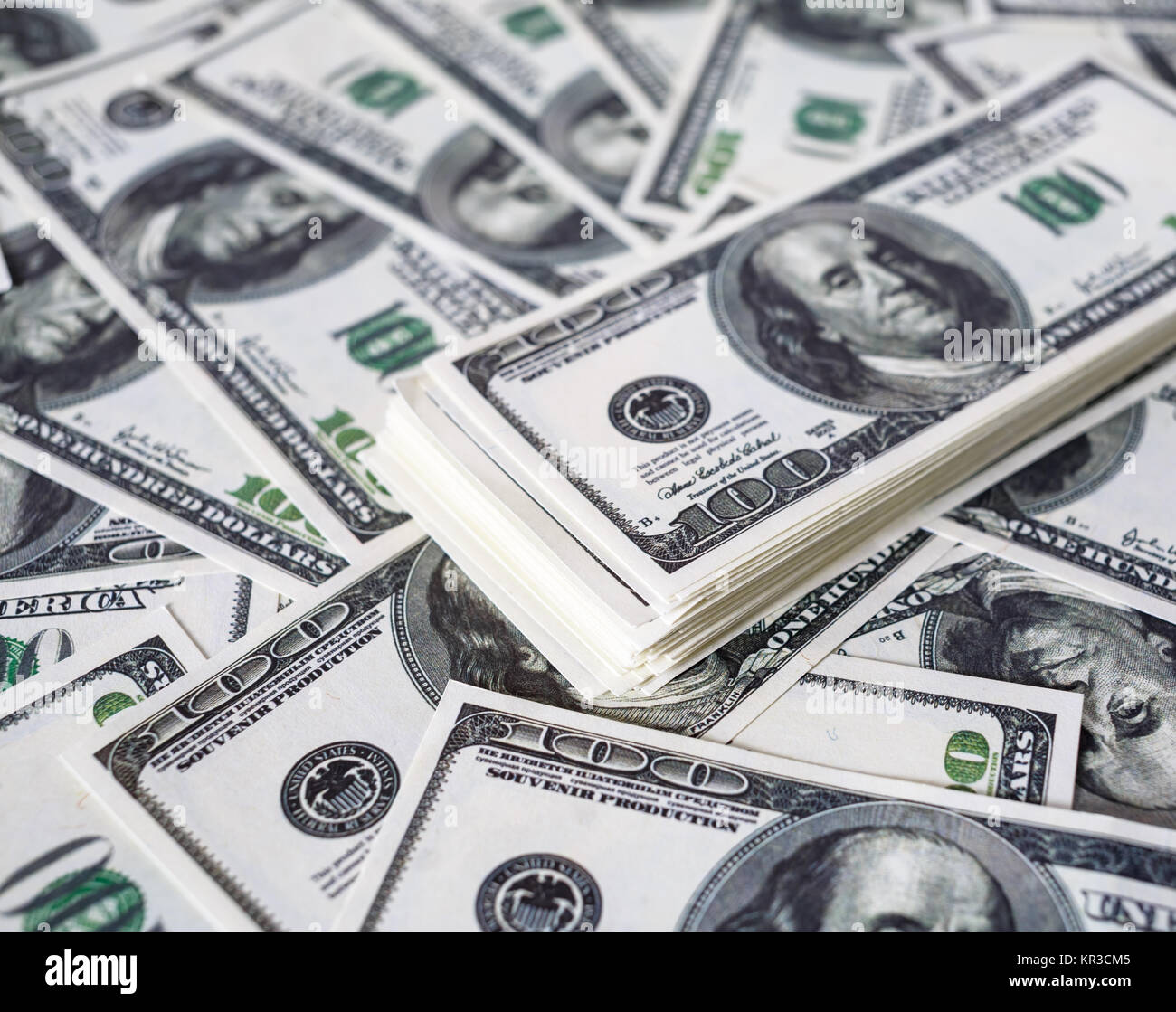 Stack of dollars Stock Photo - Alamy
