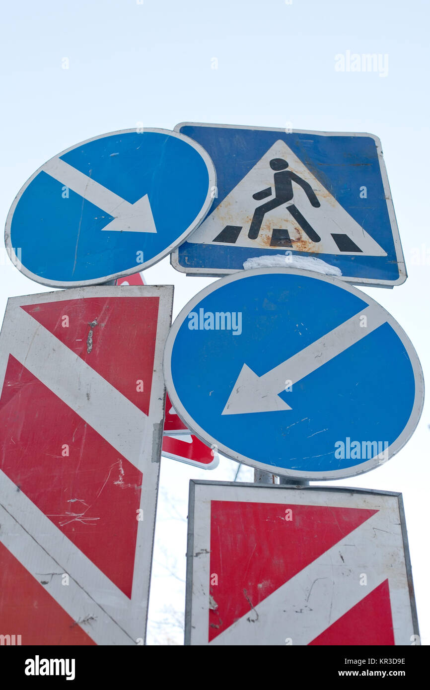 confusion conflict of direction arrows traffic signs Stock Photo - Alamy