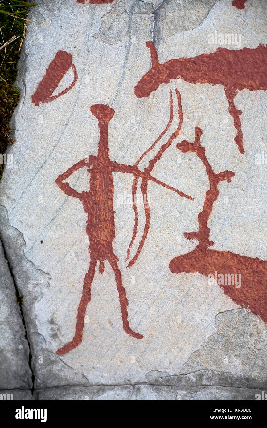 prehistoric rock carving petroglyphs on stone surface closeup, Alta ...