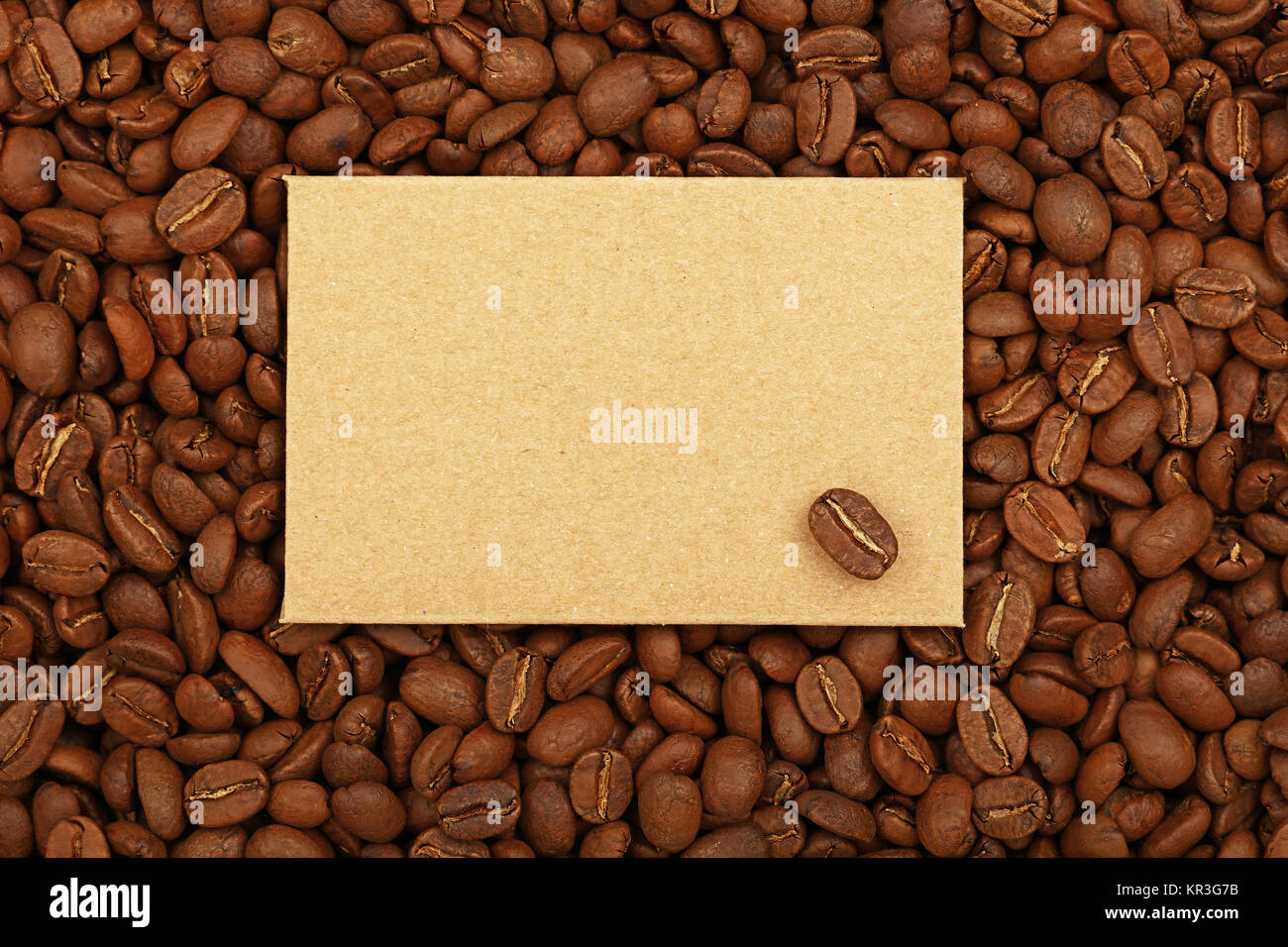 Close up blank brown kraft paper sign with copy space on background of ...