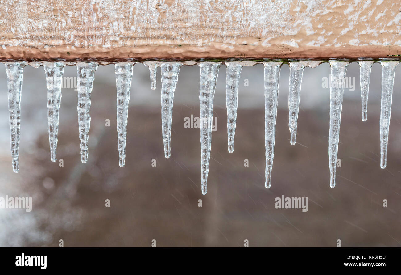 pattern of ice crystal hanging un a peace of wood Stock Photo - Alamy