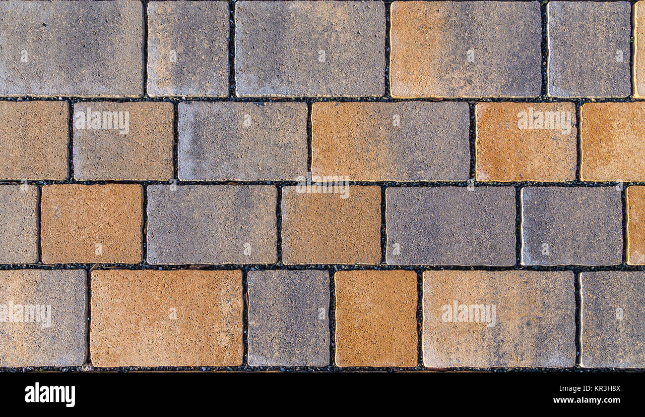 red Paving blocks made of square stone in bright ligh Stock Photo - Alamy