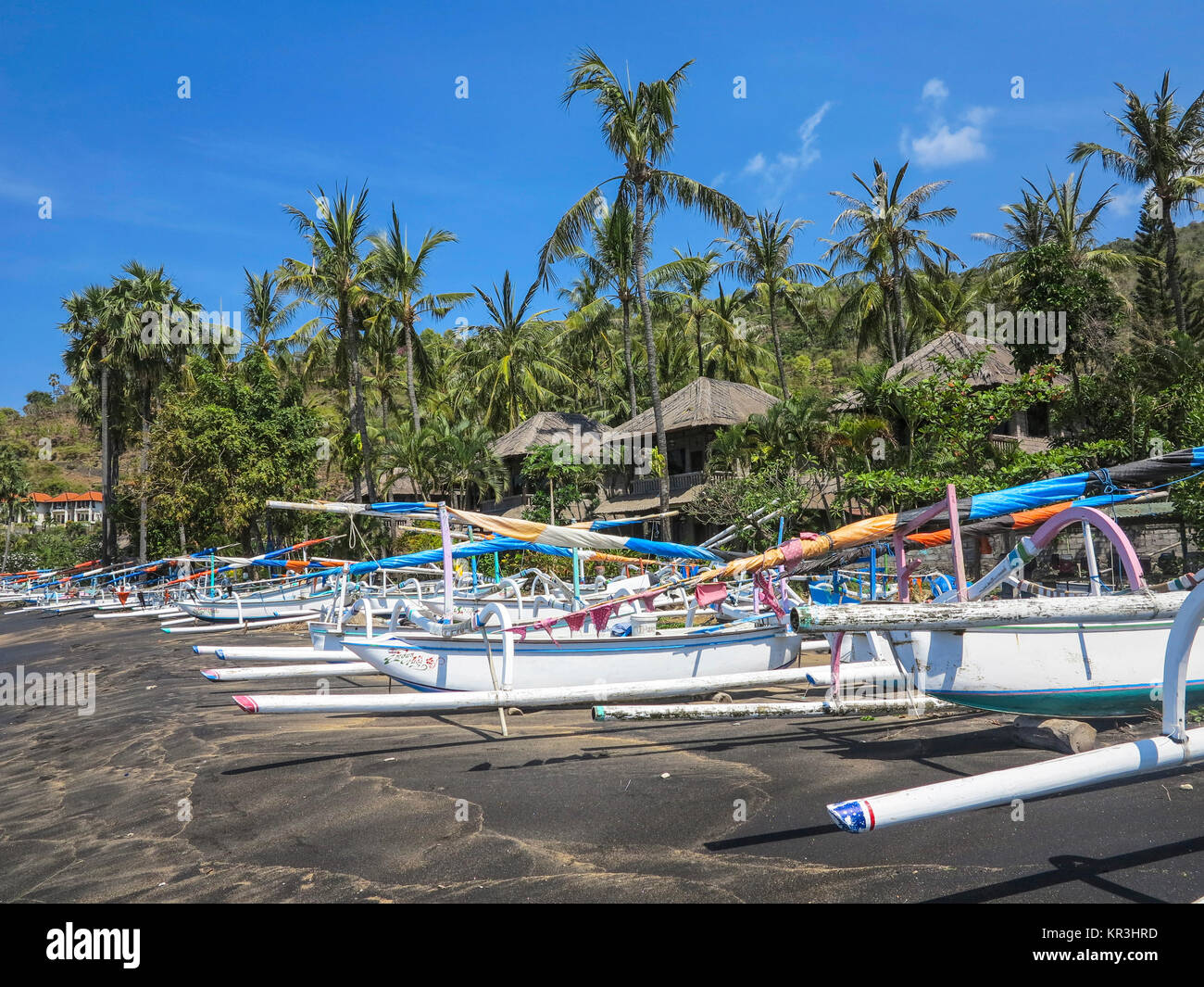 beautiful tropical beach with fishing boats and palm trees in Baki ...