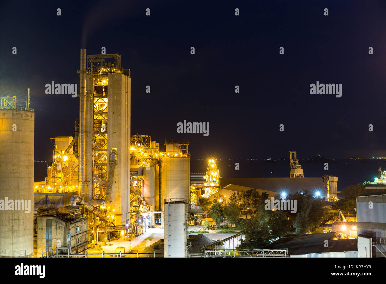Cement Plant and power sation at night Stock Photo - Alamy
