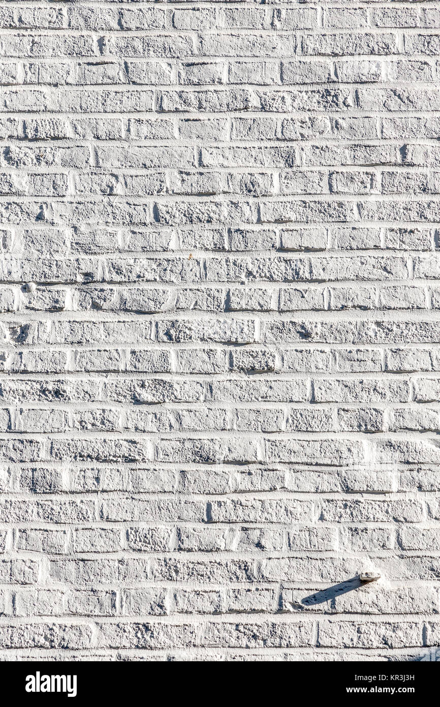 old white painted bricks at an old house wall Stock Photo - Alamy
