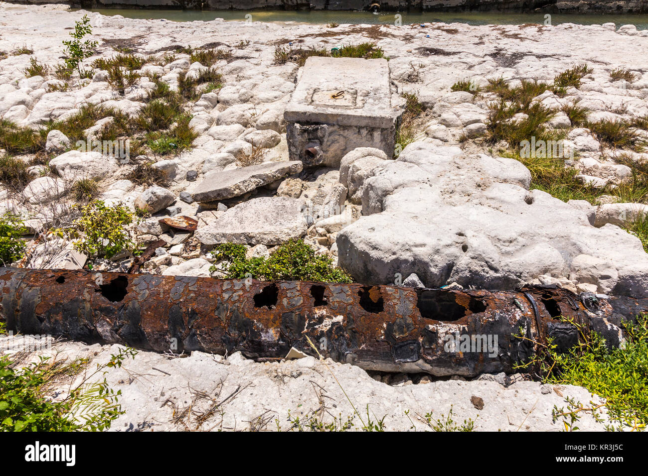 old rusty tubes at the beach Stock Photo - Alamy