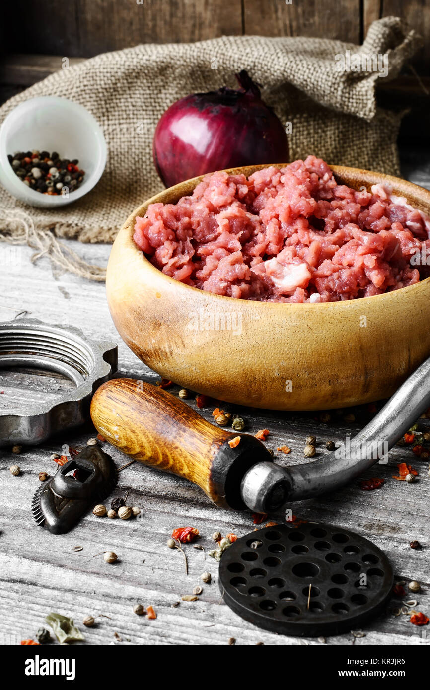 meat ground in meat grinder Stock Photo - Alamy