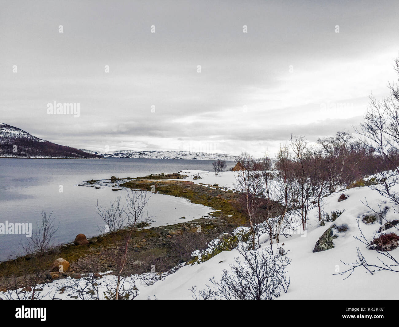 landscape in Norway under snow with icy lake Stock Photo - Alamy