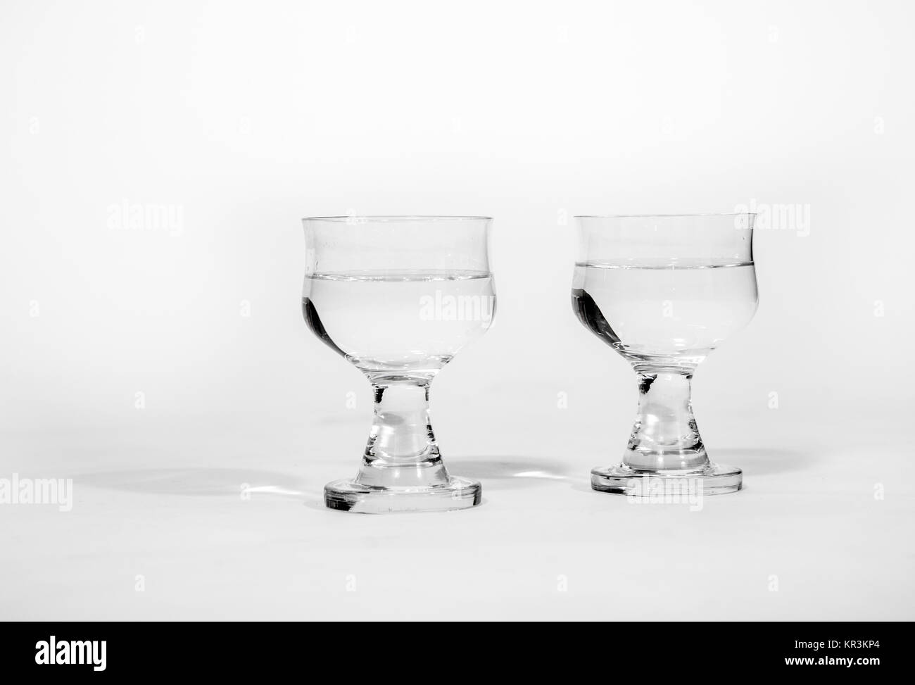 simple glass isolated on white with water Stock Photo - Alamy