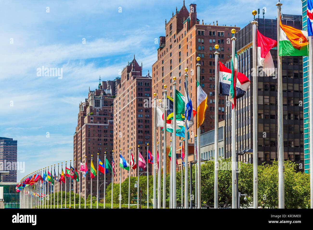 United Nations Headquarters with flags of the members of the UN Stock ...