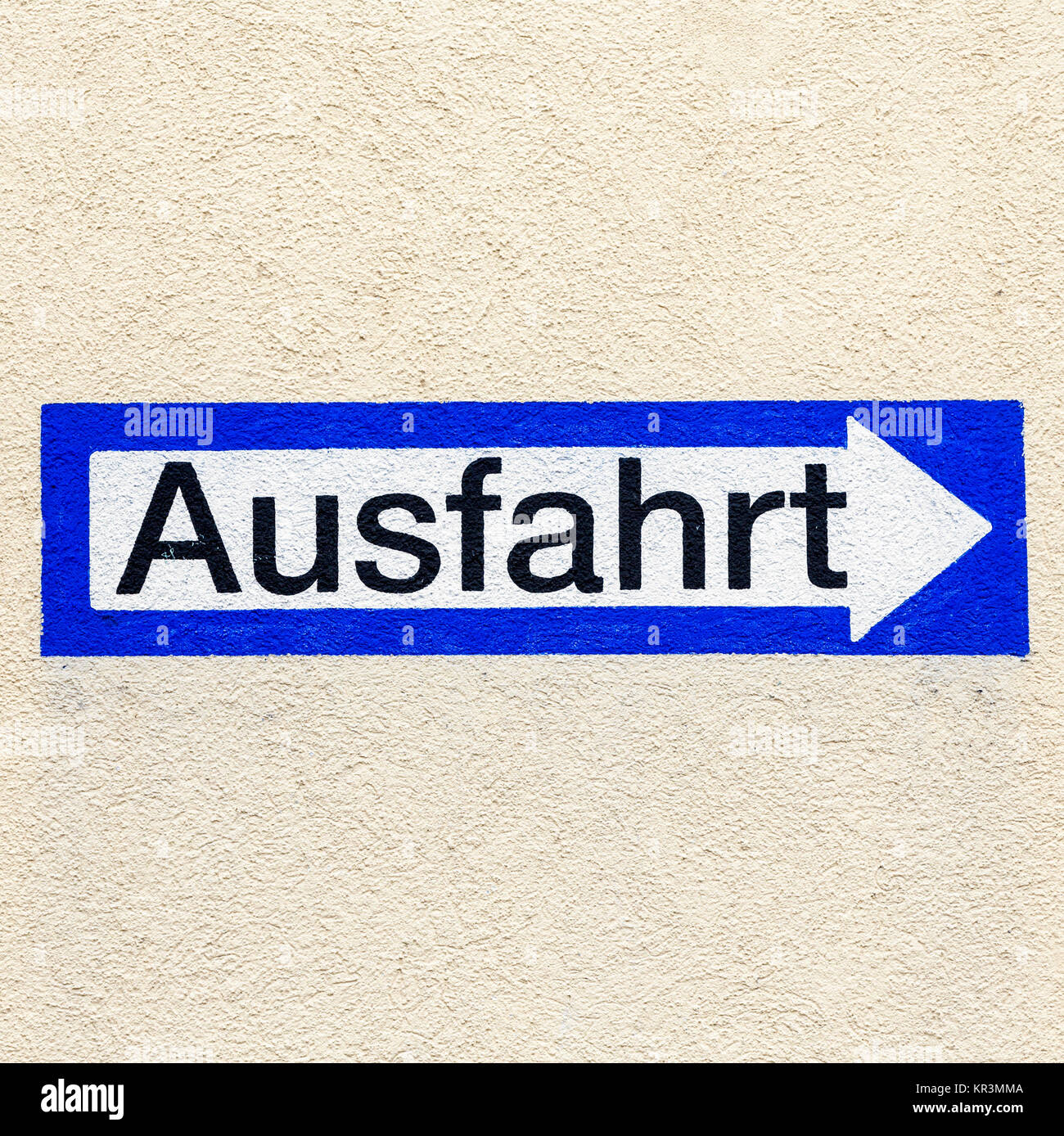 blue sign exit in german painted at a wall Stock Photo - Alamy