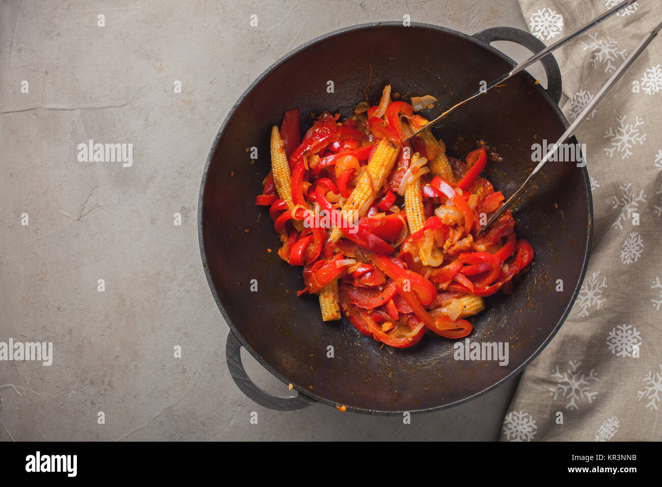 Mix of vegetables cooked in a wok. Top view with copy space Stock Photo ...