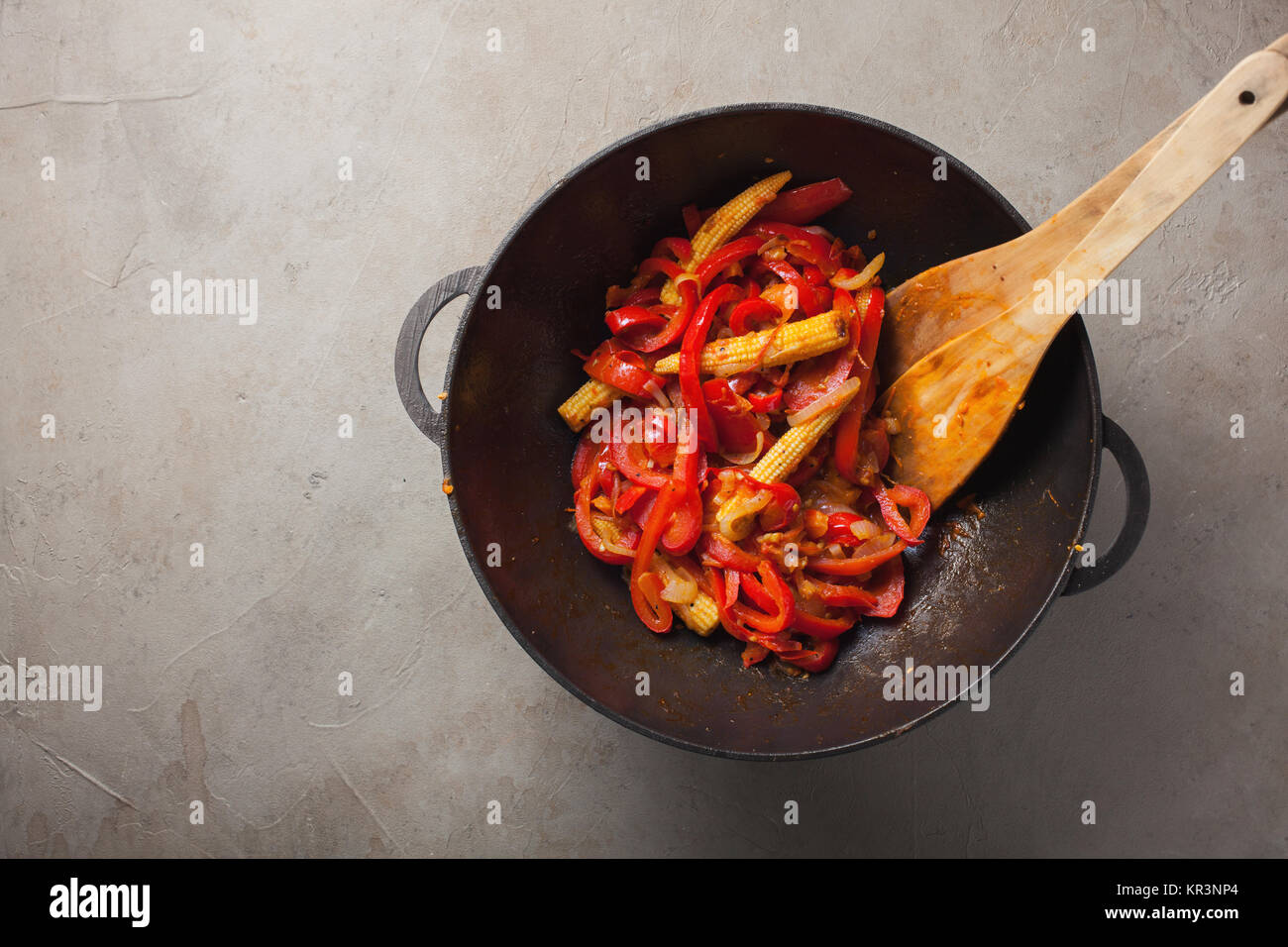 Mix of vegetables cooked in a wok. Top view with copy space Stock Photo ...