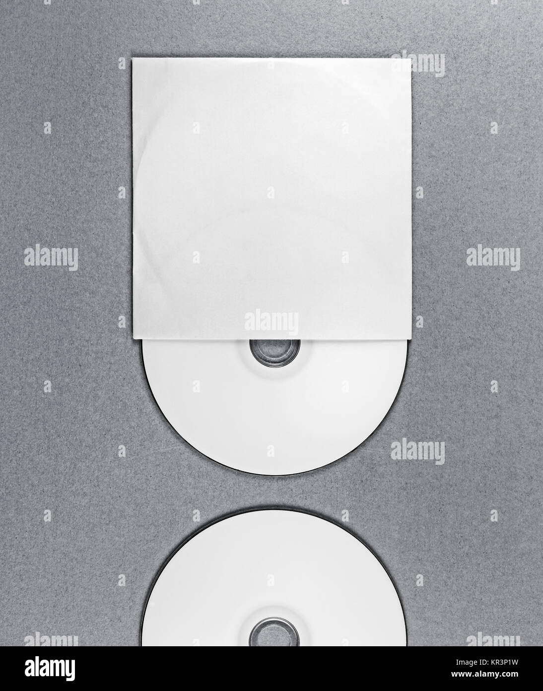 Blank CD on gray Stock Photo - Alamy