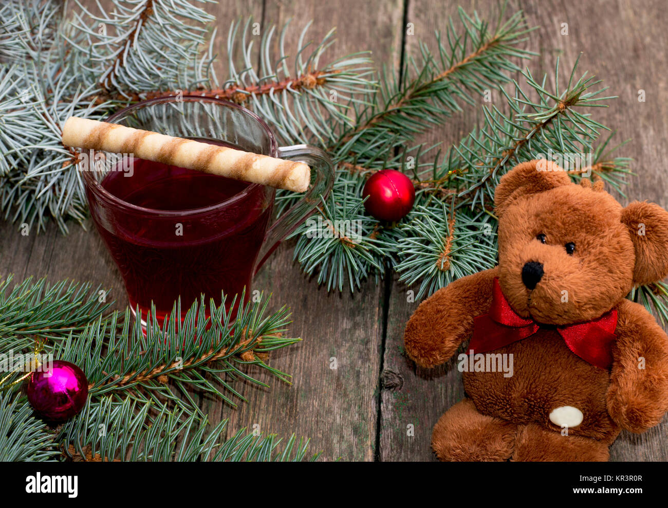 fir-tree branch, cup of tea and toy bear, still life Stock Photo - Alamy