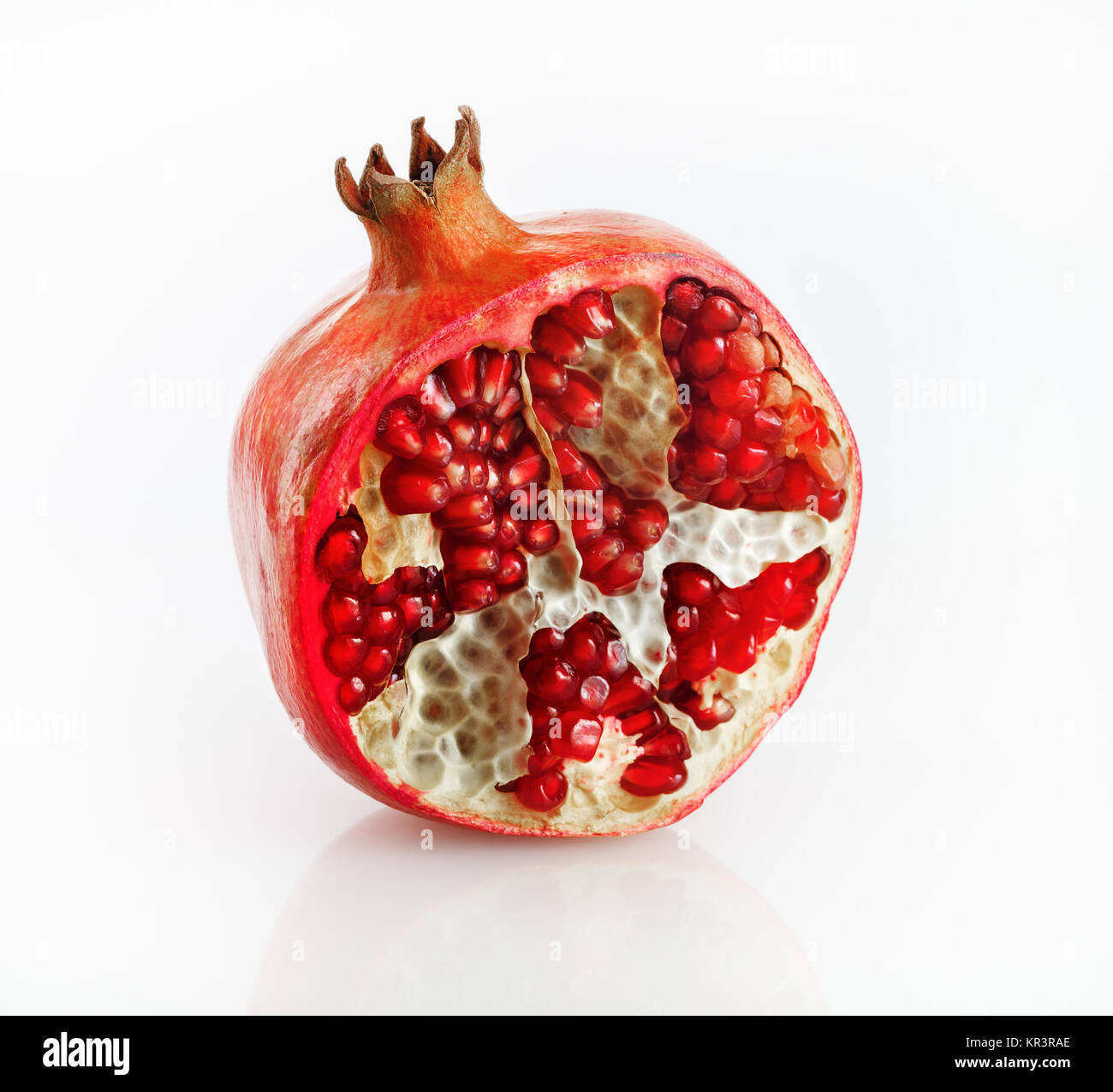 Half of pomegranate Stock Photo - Alamy