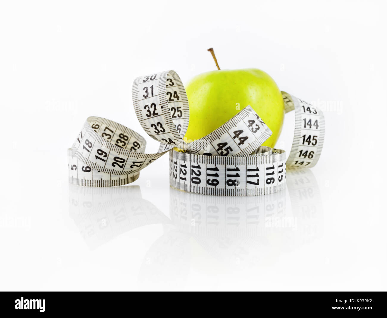 Apple and measuring tape Stock Photo - Alamy