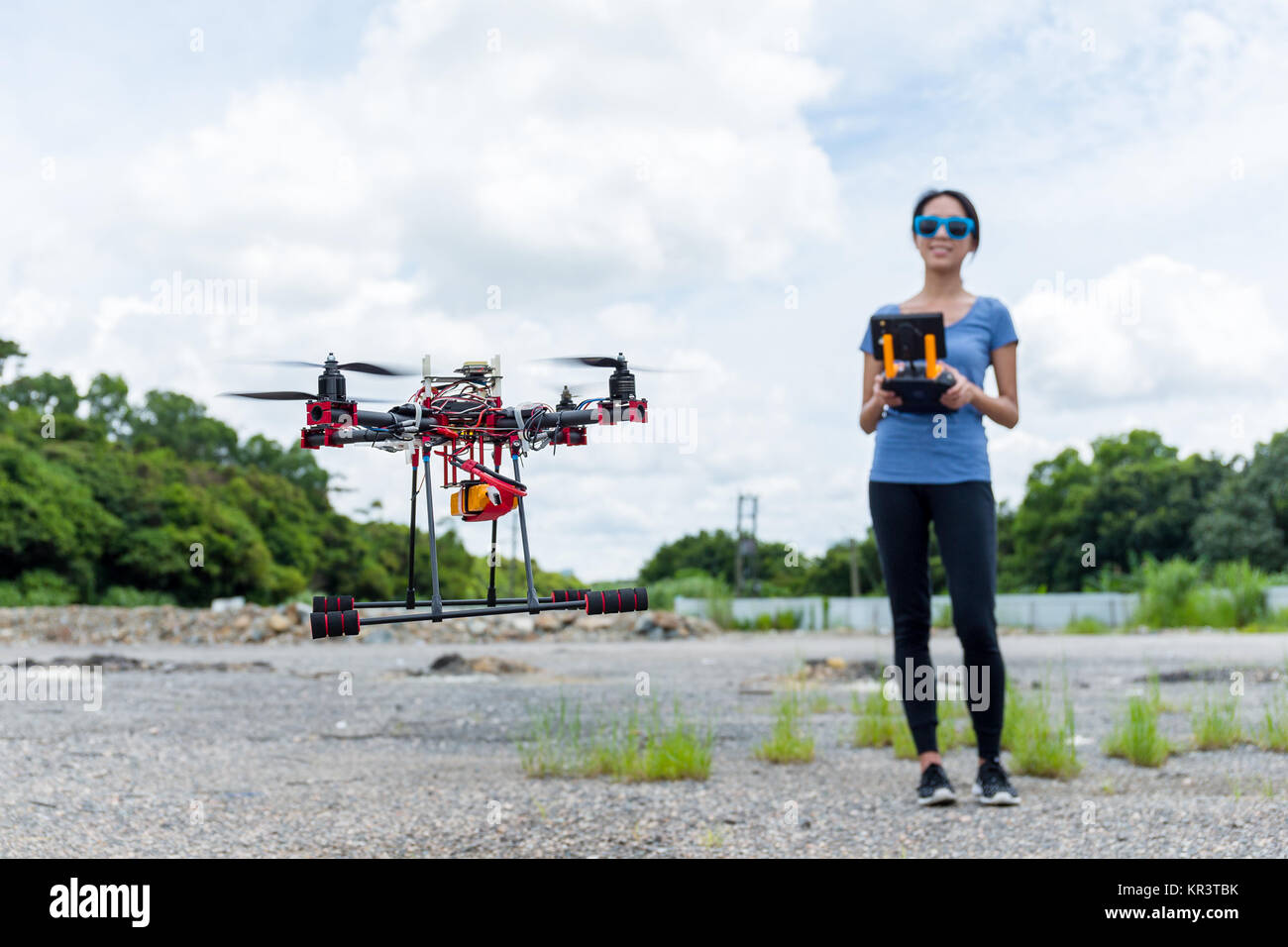 Asian woman use drones in the outdoor Stock Photo - Alamy